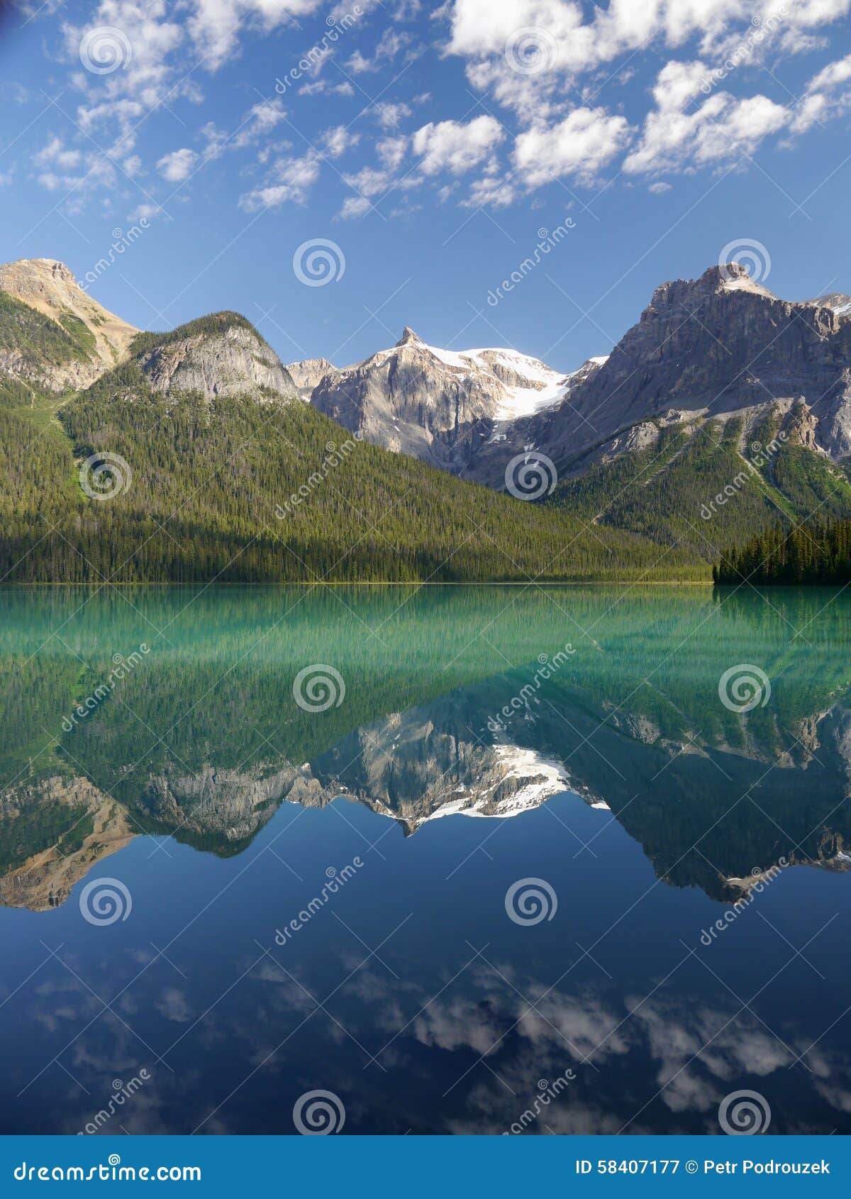 Mountains and Clouds Reflected in a Mountain Colored Lake. Stock Image ...