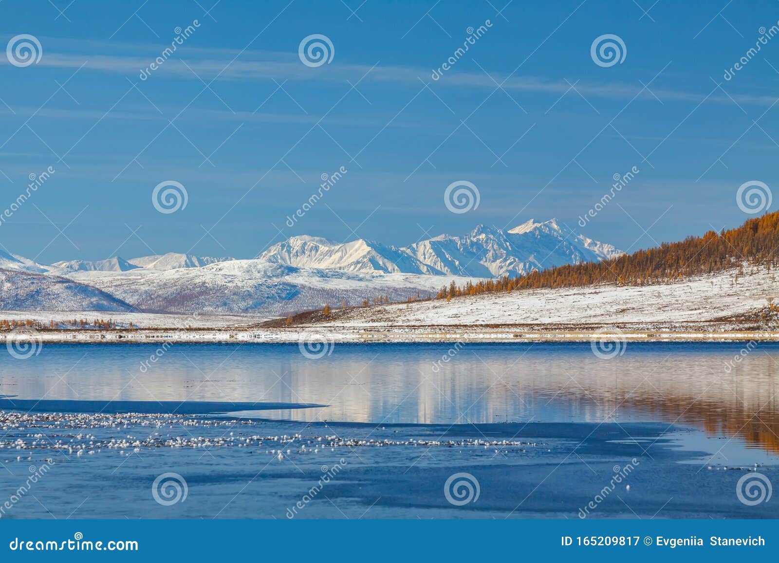 Mountains Covered with Snow with Yellow Trees and Lake in September ...