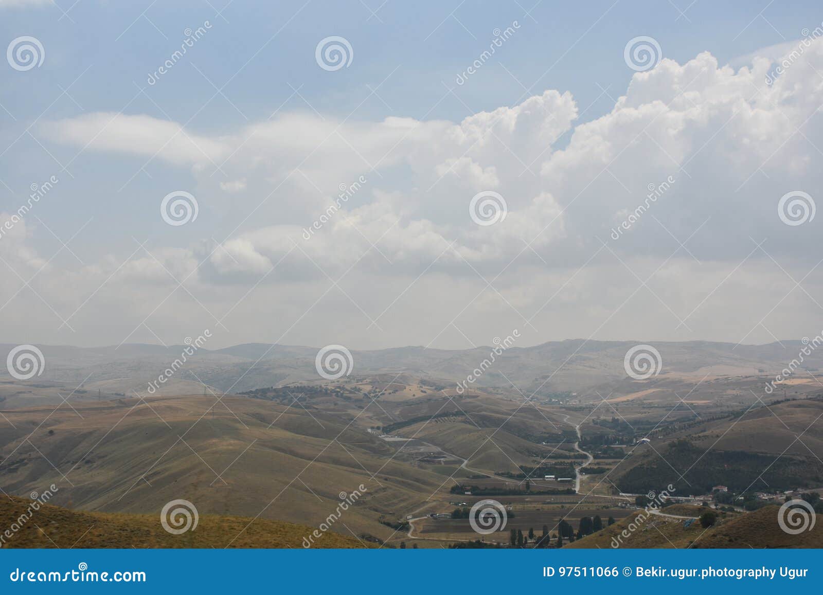 Mountains Fluffy Clouds stock photo. Image of landmark - 97511066