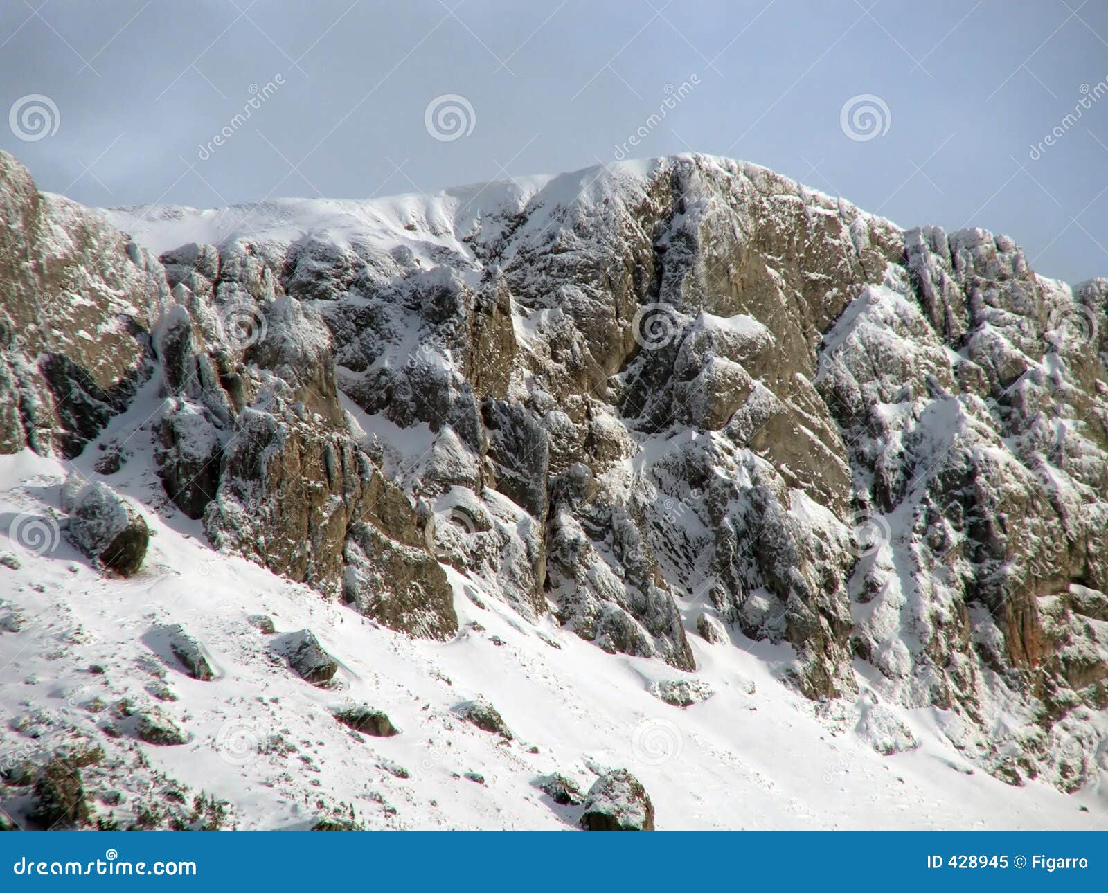 Mountains with little snow stock image. Image of cloud - 428945