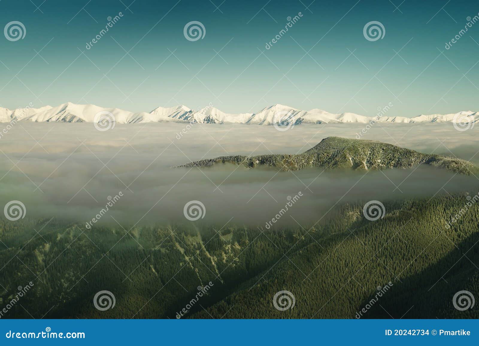 Mountains over the clouds stock photo. Image of scenery - 20242734