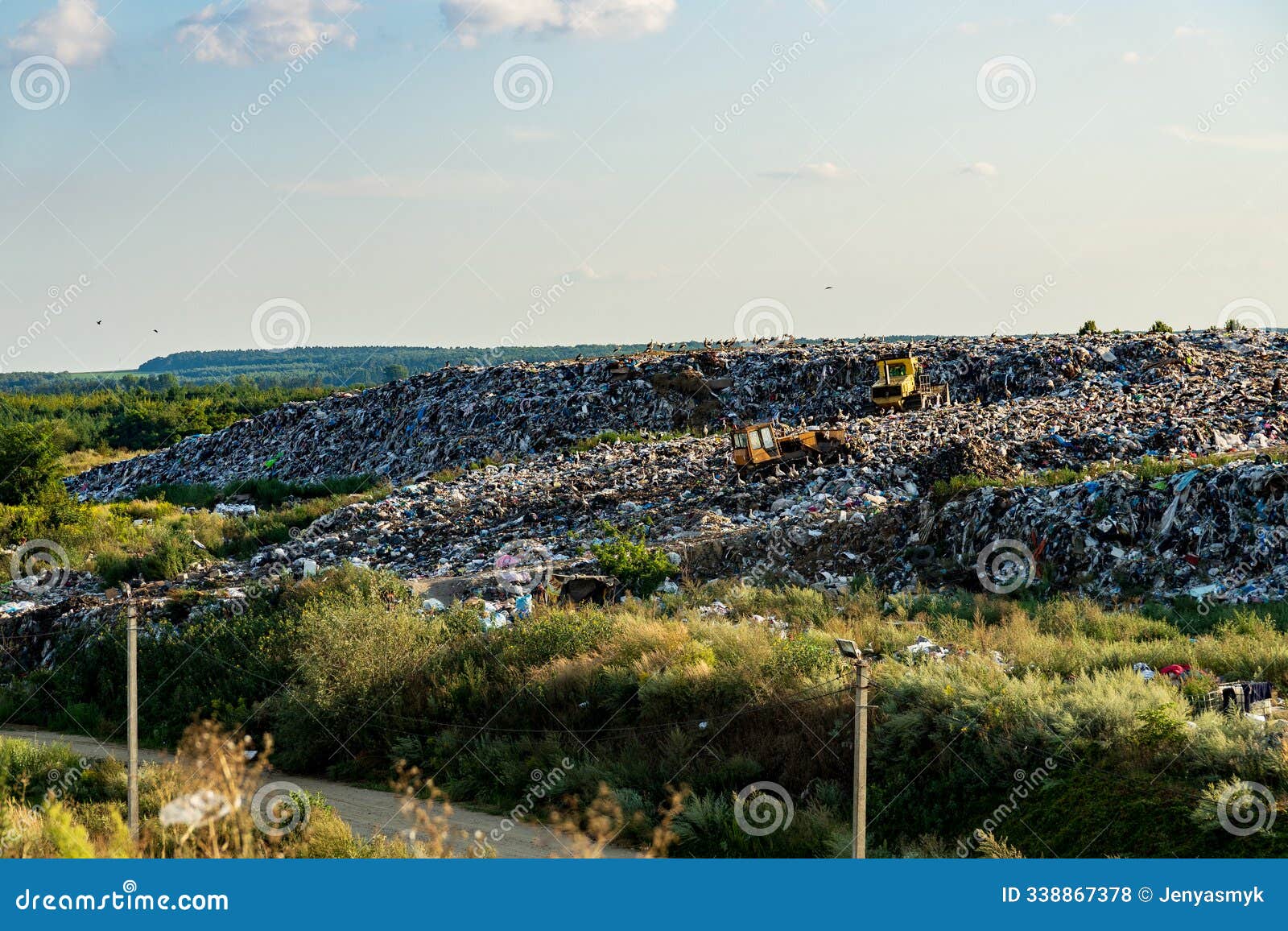 Mountains of Refuse Accumulate at a Landfill Site Surrounded by ...