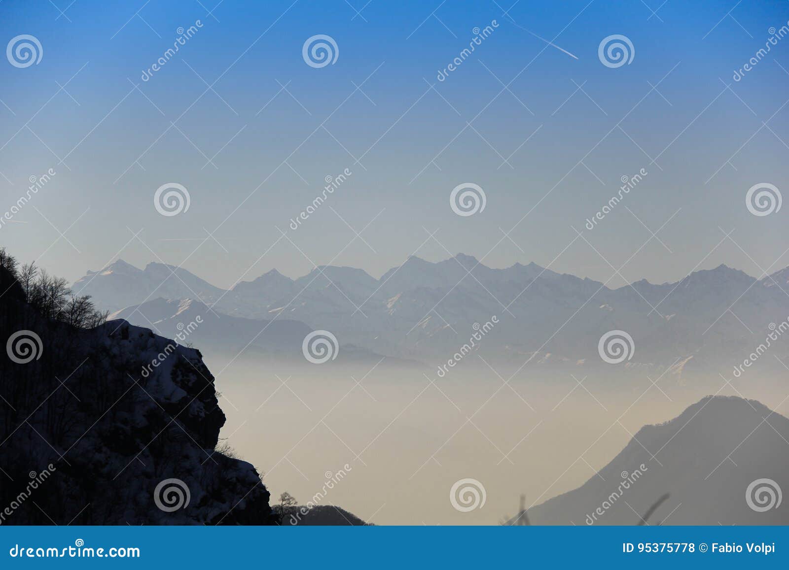 Mountains with Rocks and Mist Stock Photo - Image of alps, ridge: 95375778