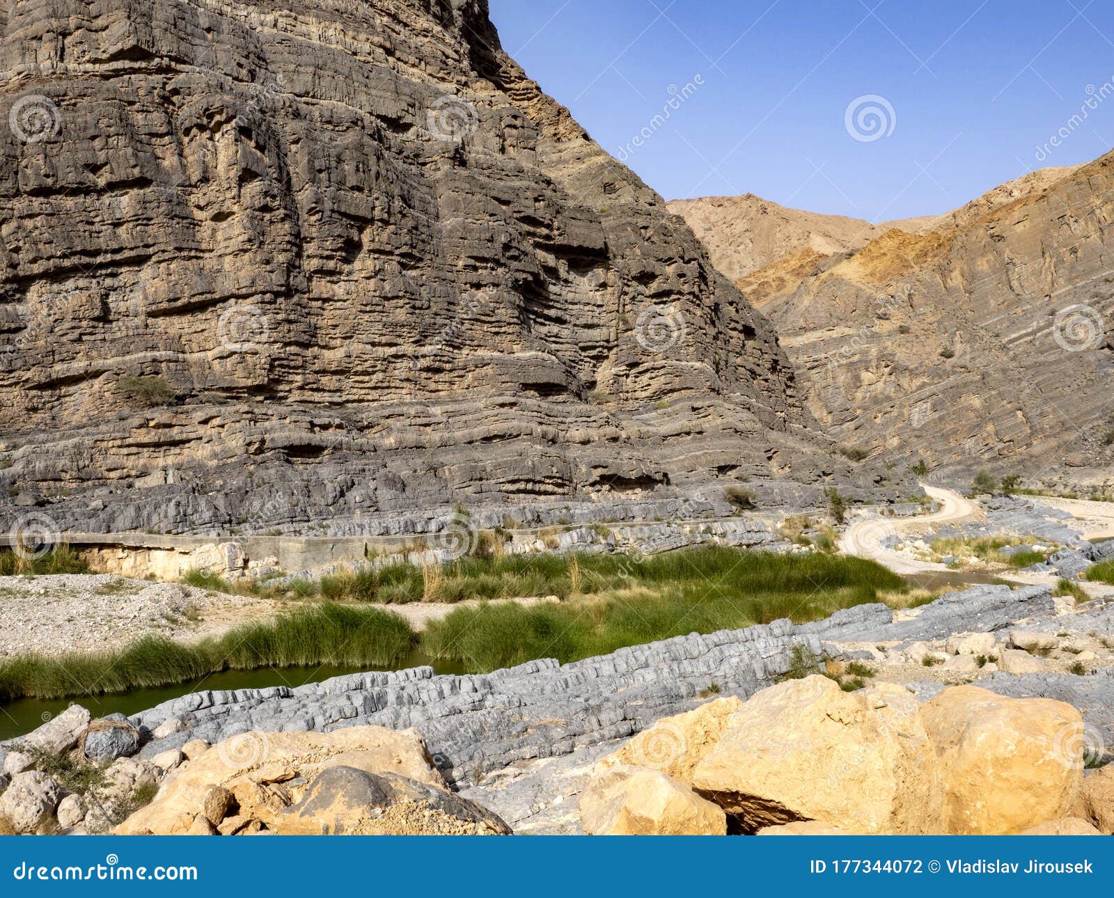 In the Mountains There are Wide Dry Wadi in Summer. Oman Stock Photo ...