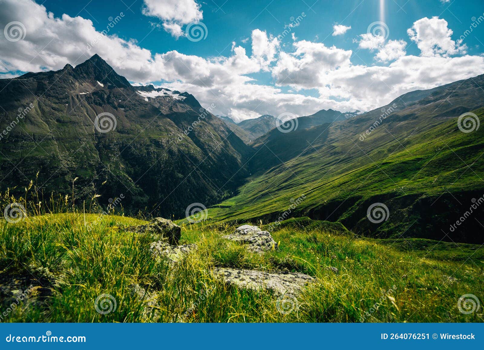 With Valley View Sunlit, Cloudy Sky Background Stock Image - Image of ...