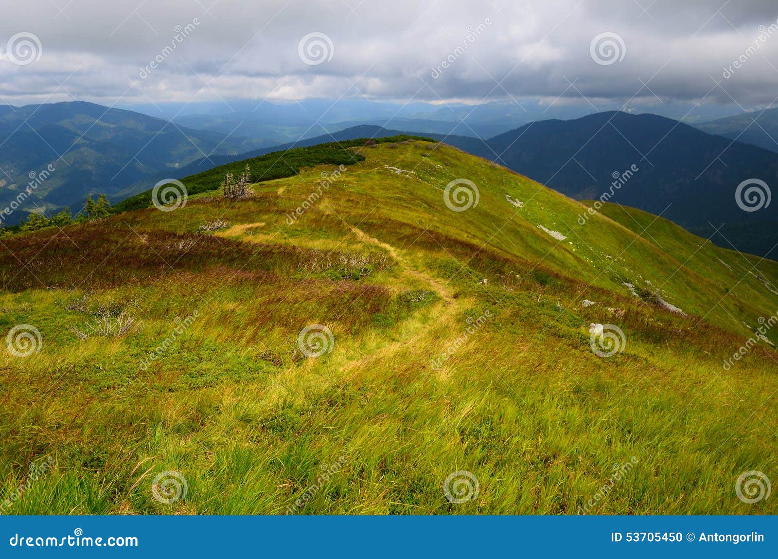 Mountains winding trail stock photo. Image of light, land - 53705450