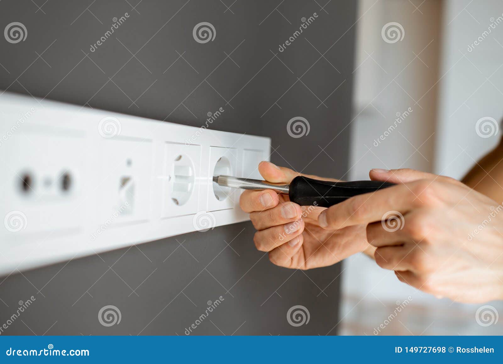 Mounting electric sockets stock photo. Image of working - 149727698