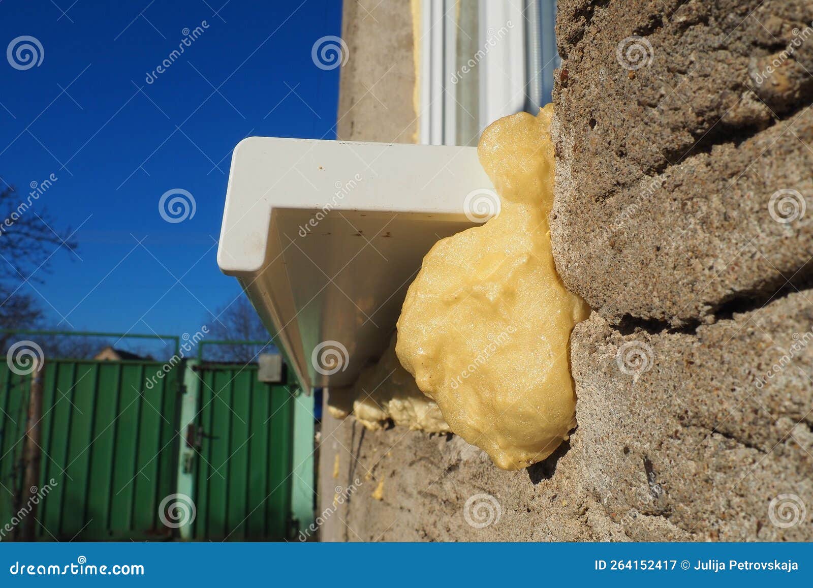 Mounting Foam Under the Window Sill.DIY Concept. Construction PU - Poly ...
