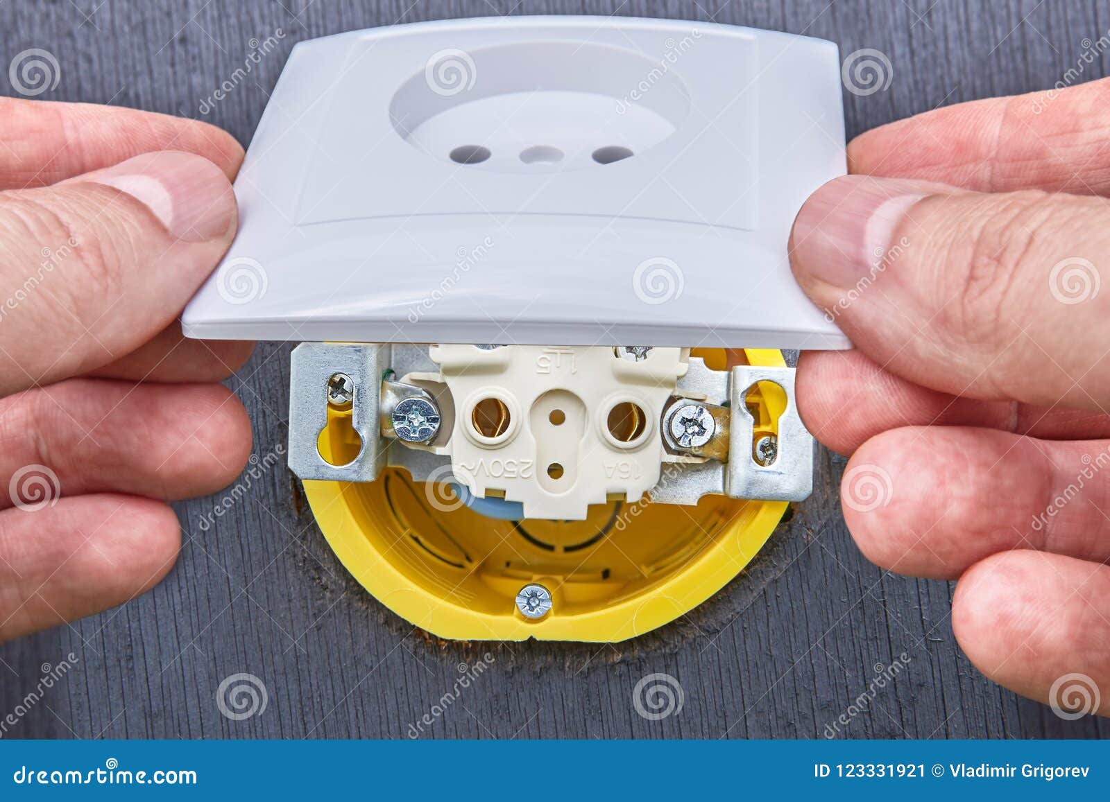 Installing Top Panel on Household Electrical Outlet. Stock Image ...
