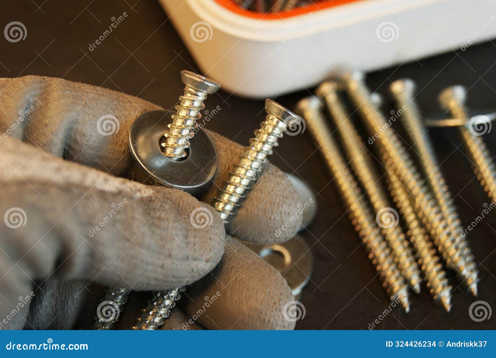 Mounting Screws in the Builder S Hand. Builder S Work Process. Stock ...