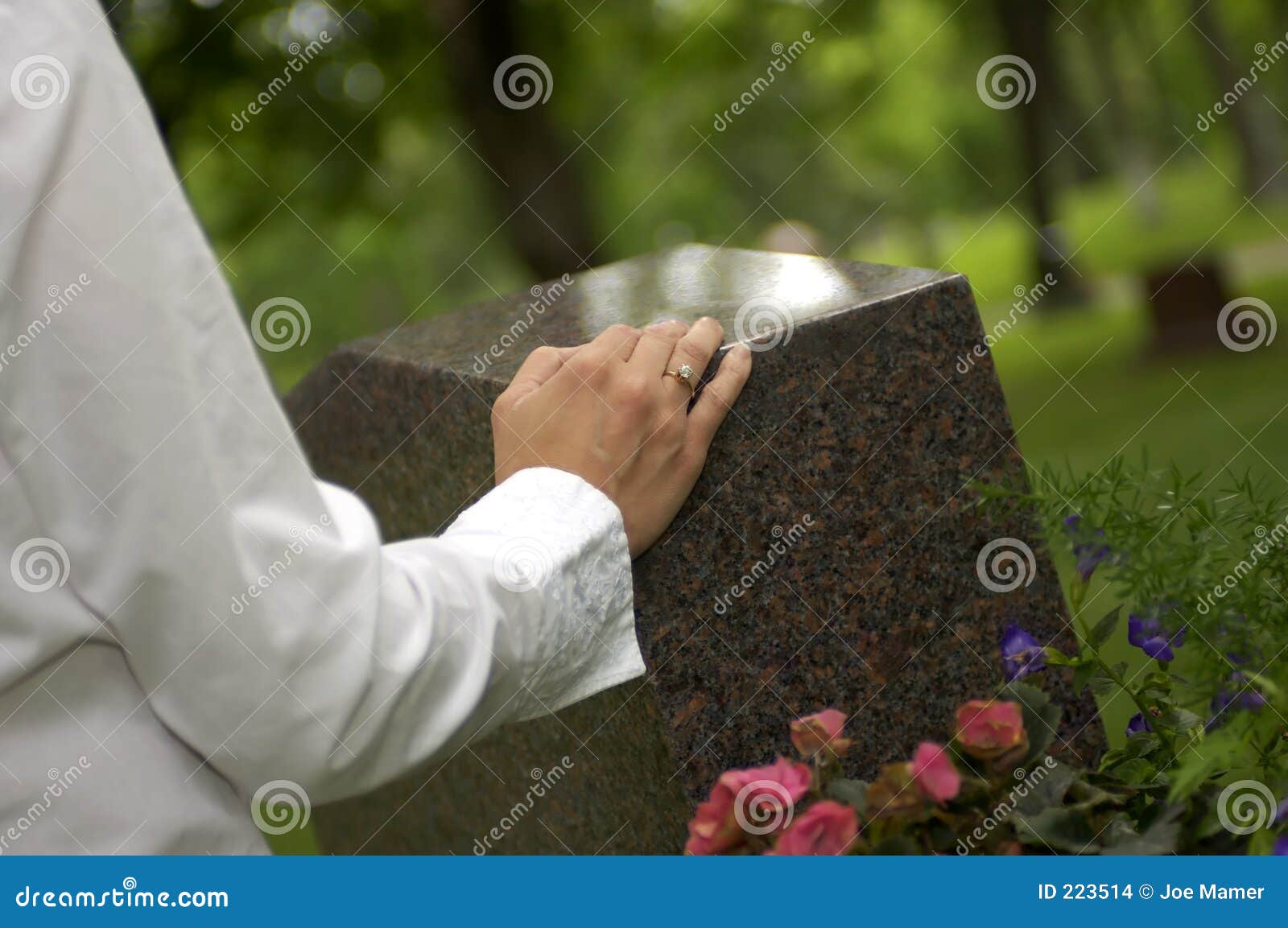 Mourning at grave 1 stock photo. Image of bury, peace, gravestone - 223514