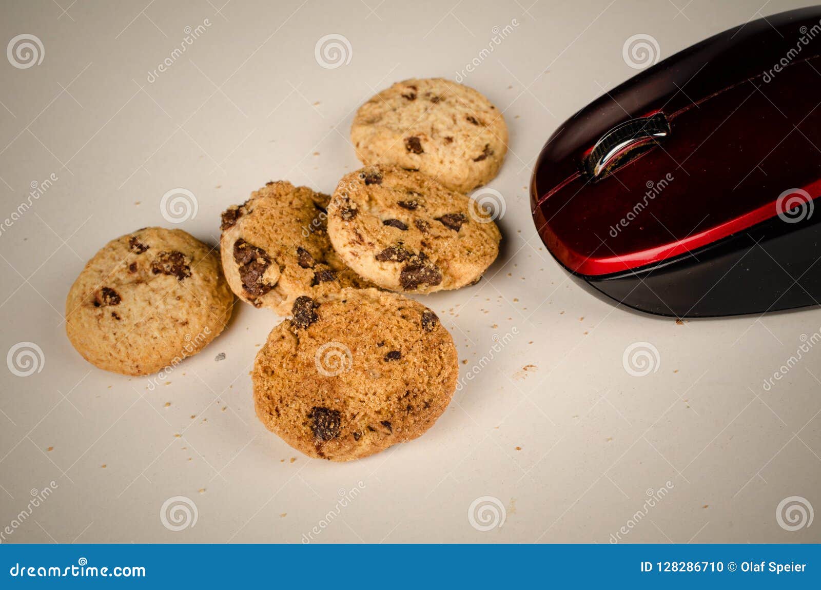 Mouse eating cookies stock photo. Image of computer - 128286710