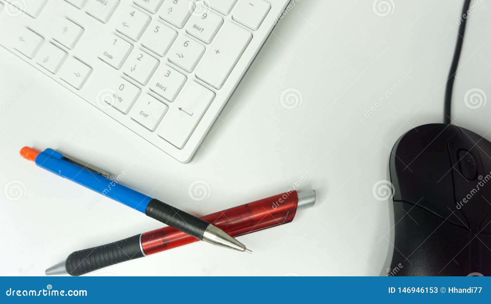 Mouse keyboard and pens stock image. Image of ballpoint - 146946153