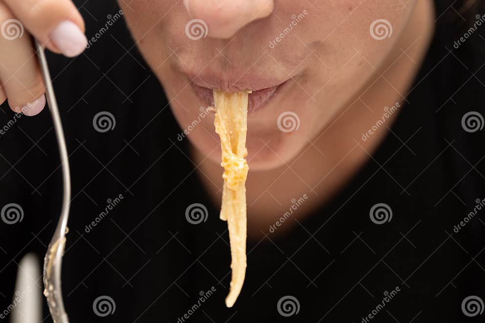 Mouth Eats Spaghetti. Close-up Shot of the Eating Process Stock Image ...