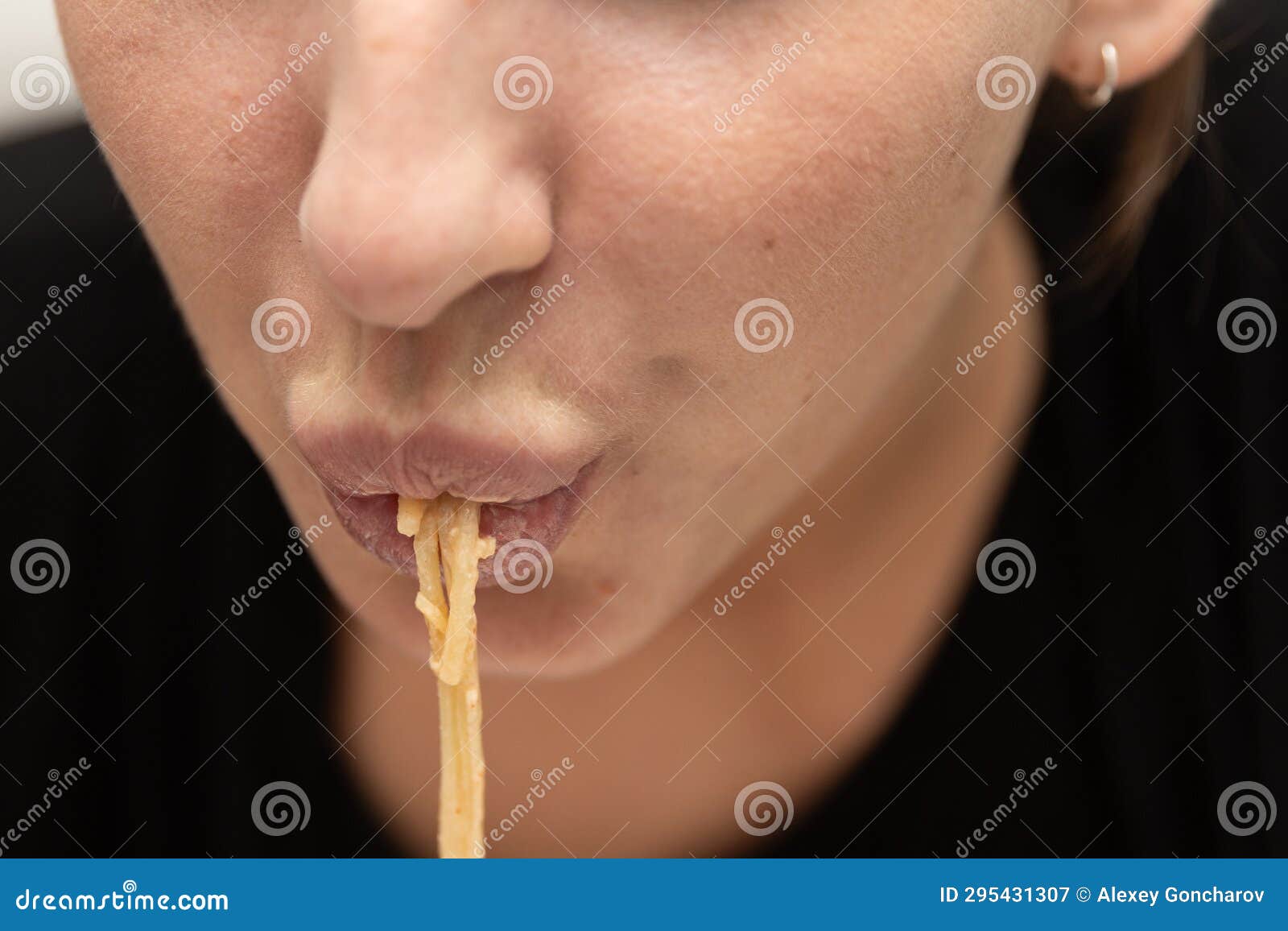 Mouth Eats Spaghetti. Close-up Shot of the Eating Process Stock Image ...