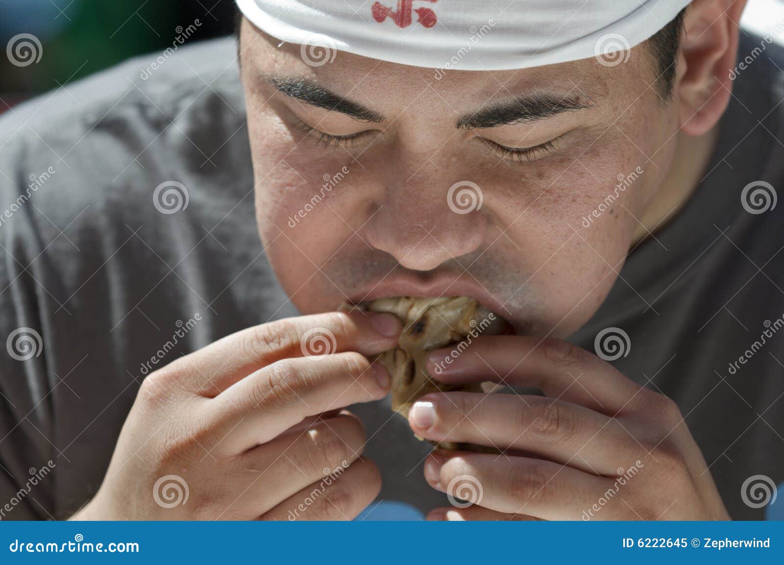 Mouthful editorial image. Image of band, concentrate, eating - 6222645