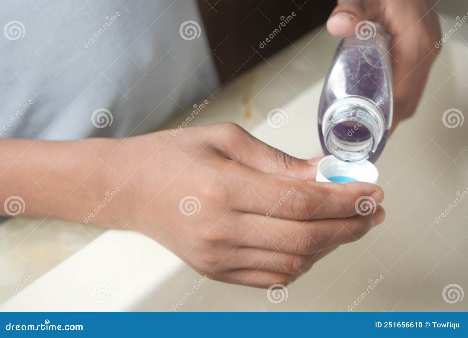 Mouthwash Liquid Flowing into a Cap Stock Photo - Image of dental ...