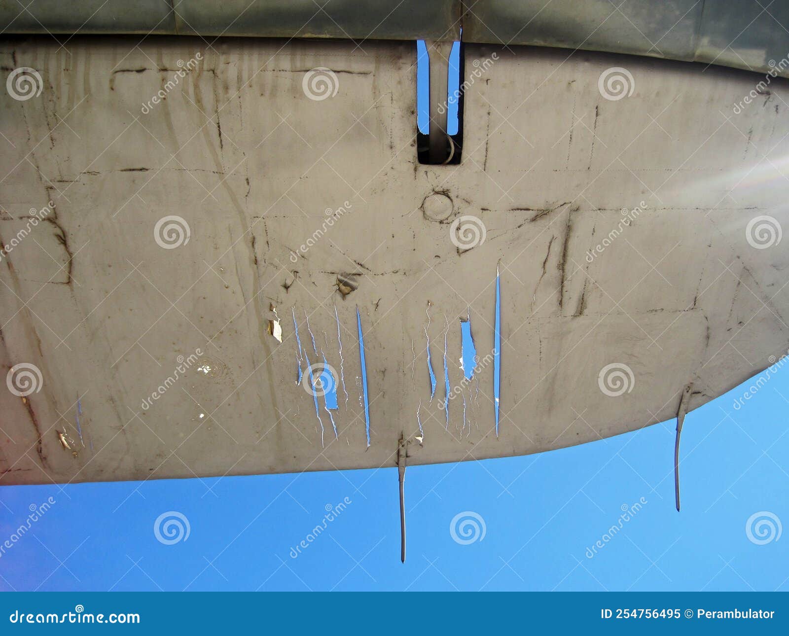 MOVABLE FLAP with TORN CANVAS on an AIRCRAFT WING Stock Image - Image ...