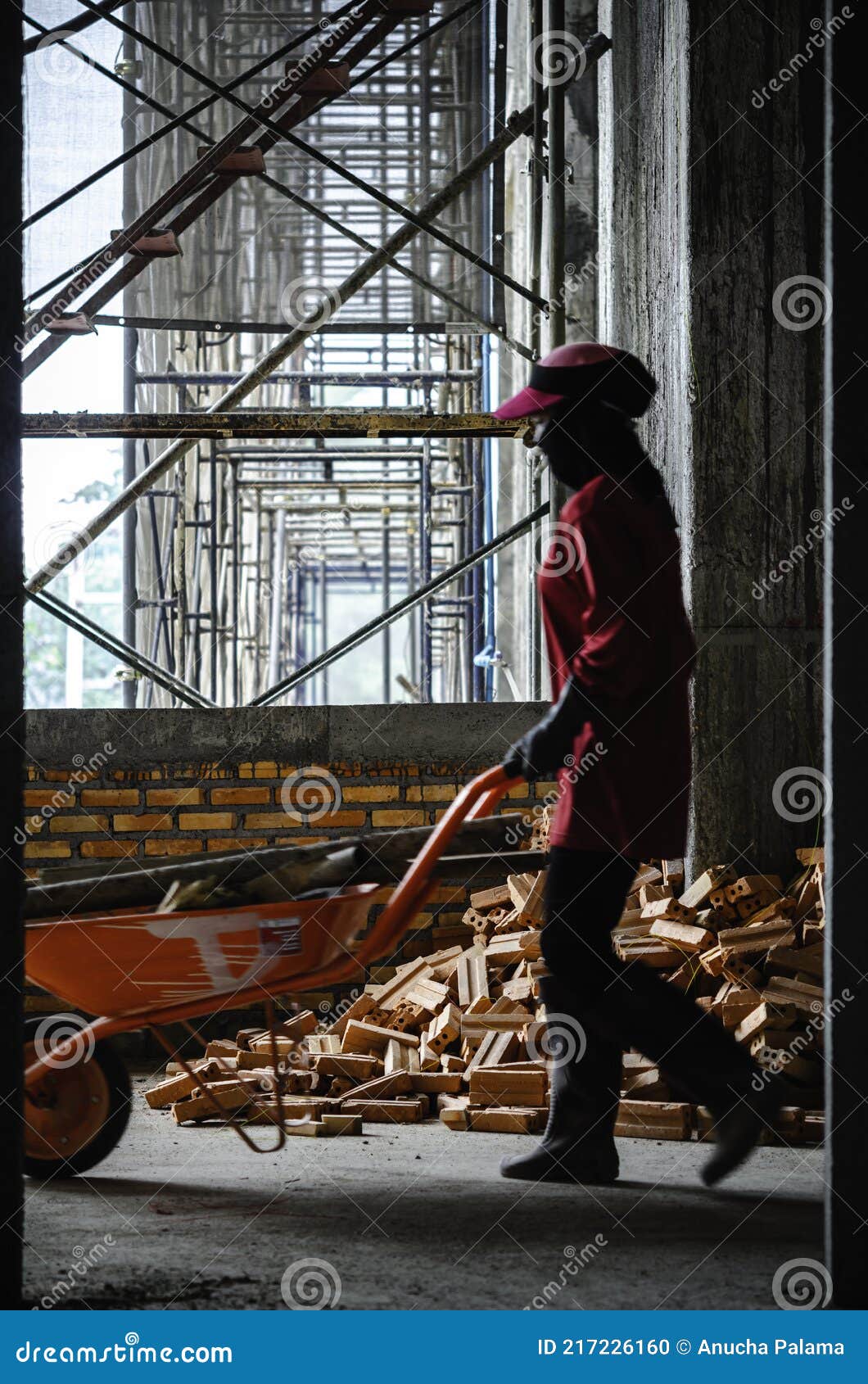 The Movement of the Construction Worker Using . Pushing, Wheels Cement ...