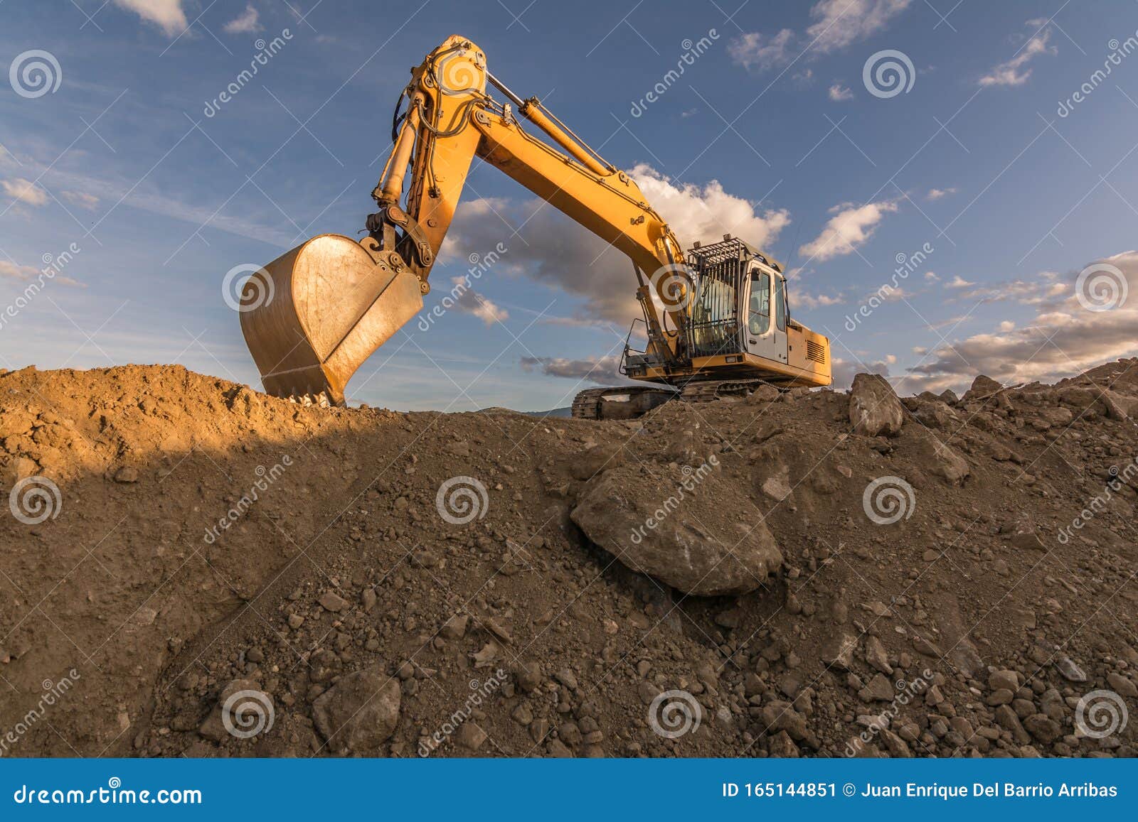 Movement of Earth and Rock in a Construction Site Stock Image - Image ...