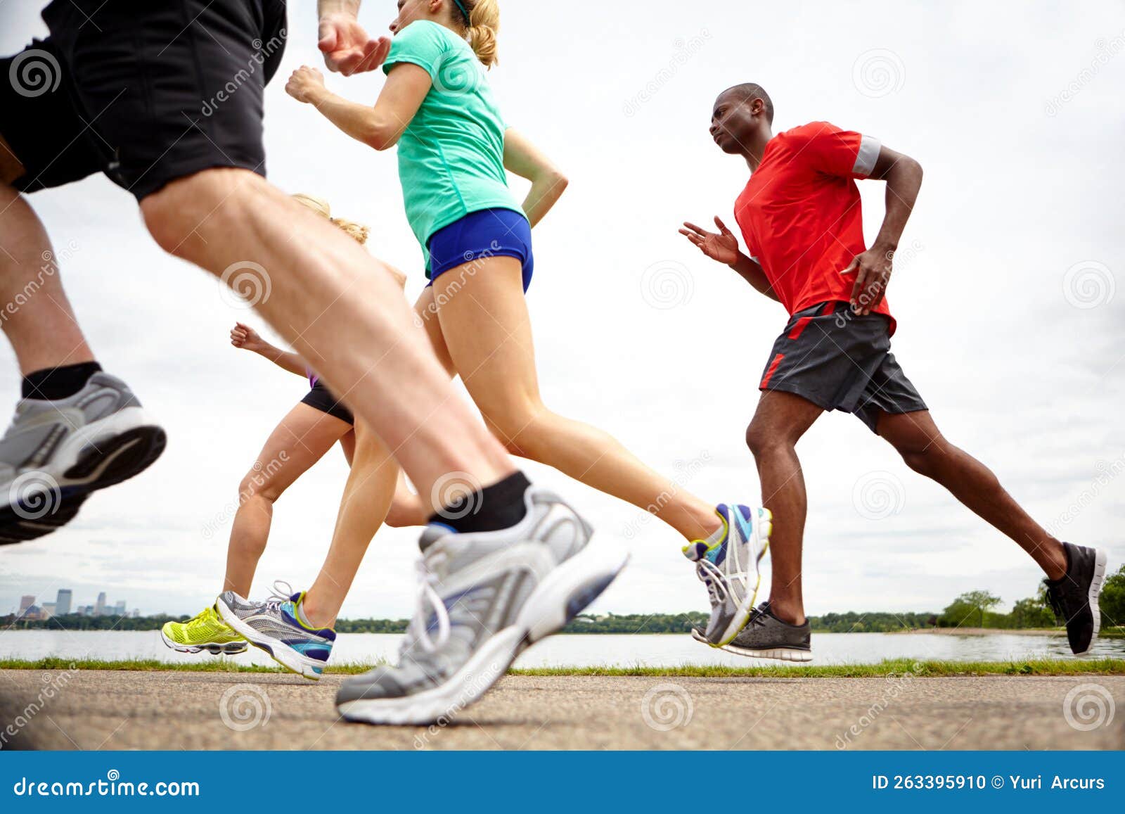 Movement and Motion. Low Angle Side View of Athletes Running a Race ...