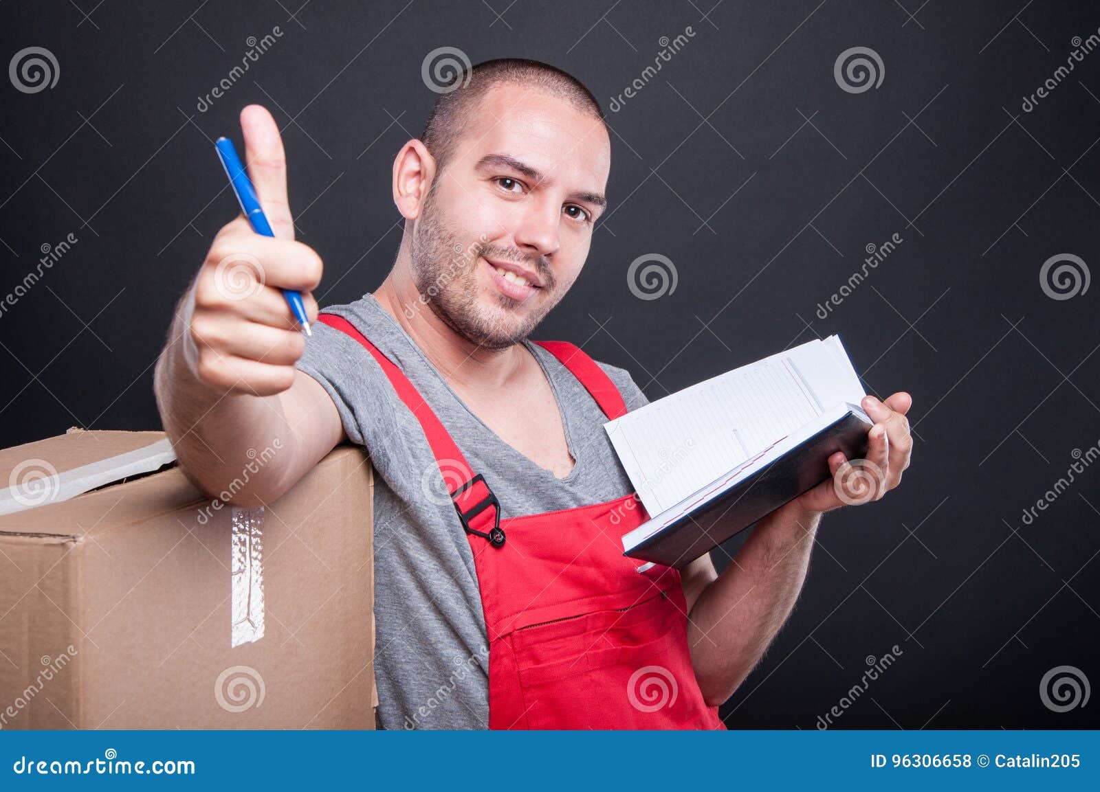 Mover Guy Holding Agenda Making Thumb Up Gesture Stock Photo - Image of ...