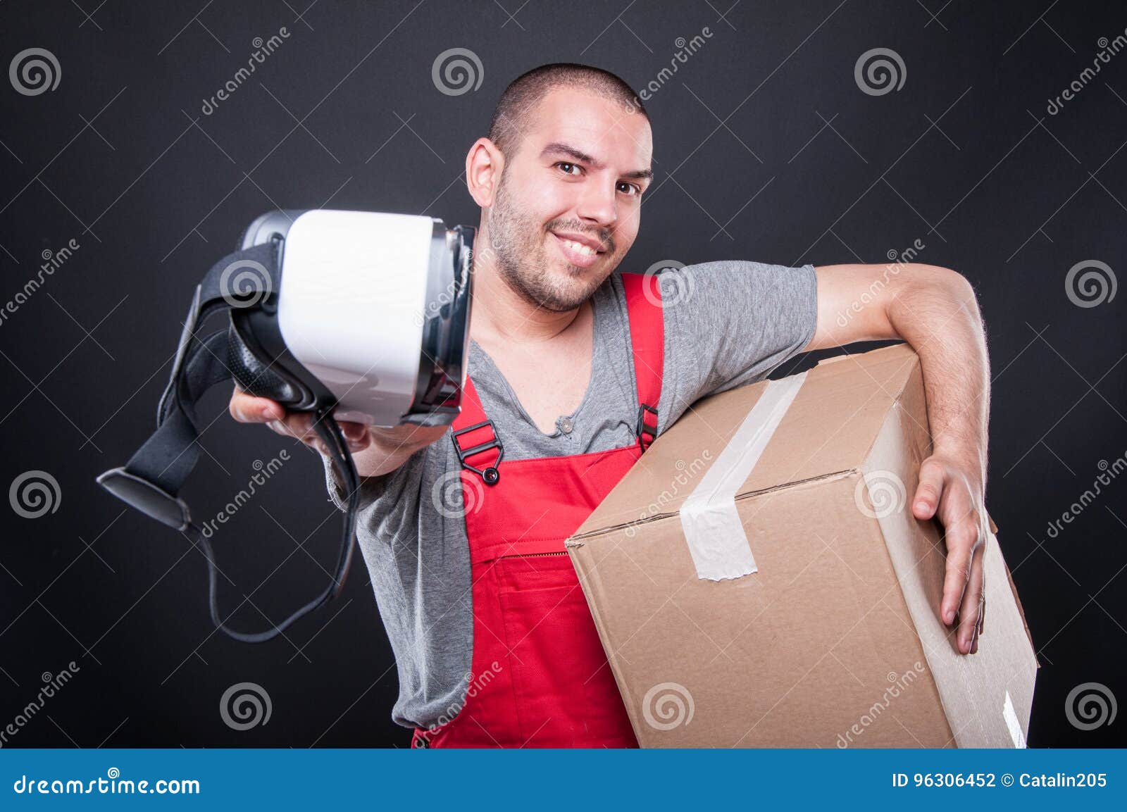 Mover Guy Holding Box Handing Vr Glasses Stock Photo - Image of ...