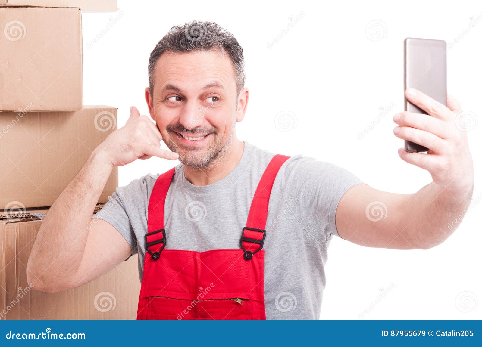 Mover Guy Making Calling Gesture Taking Selfie and Smiling Stock Image ...