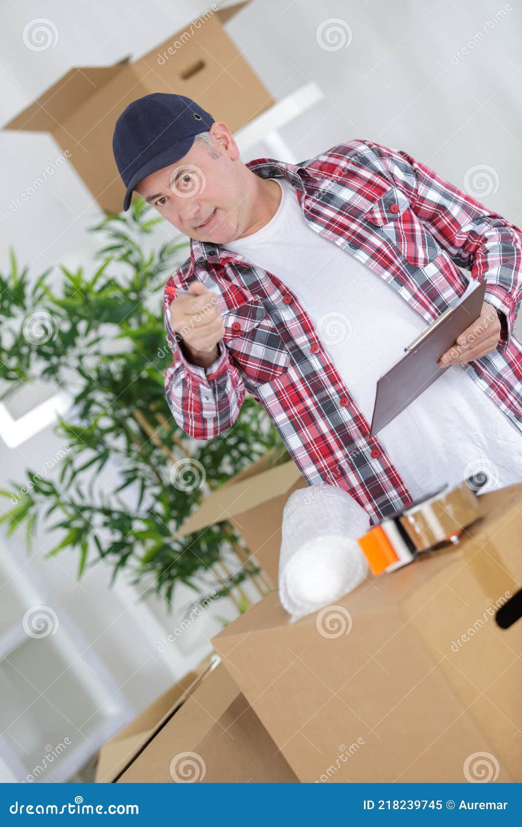 Mover Guy Multitasking with Clipboard Stock Image - Image of postal ...