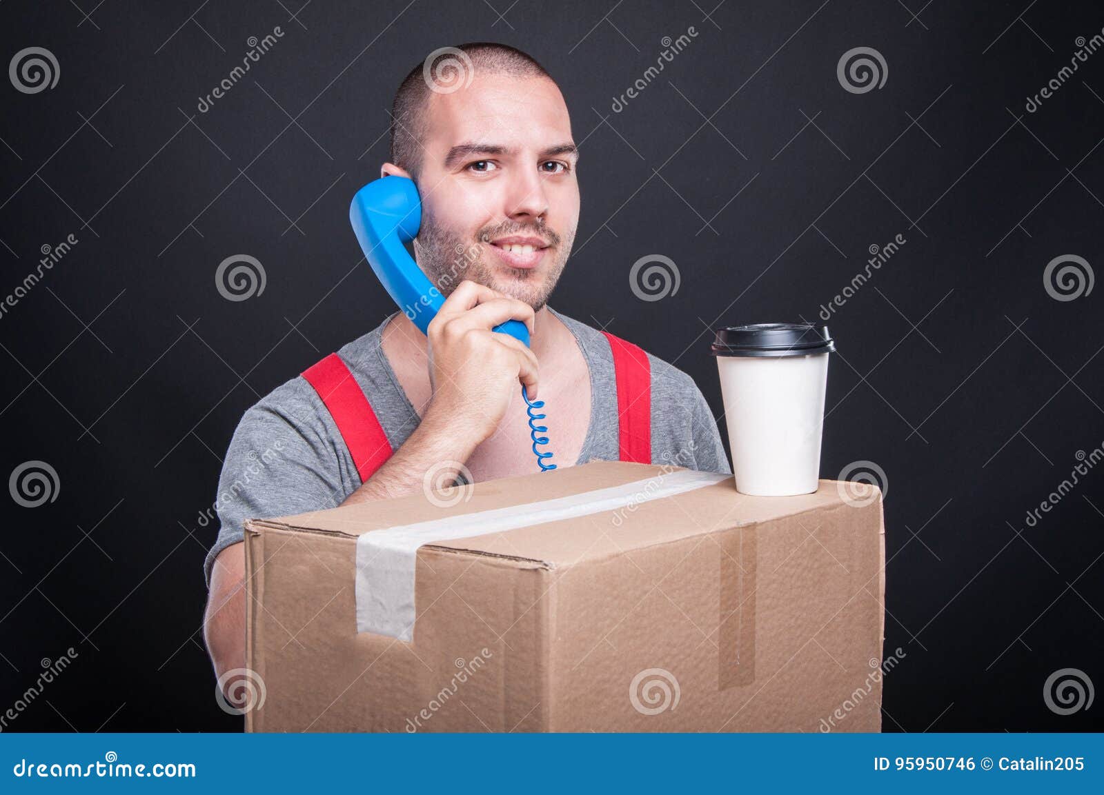 Mover Guy Posing Talking on Phone Having Coffee Stock Photo - Image of ...