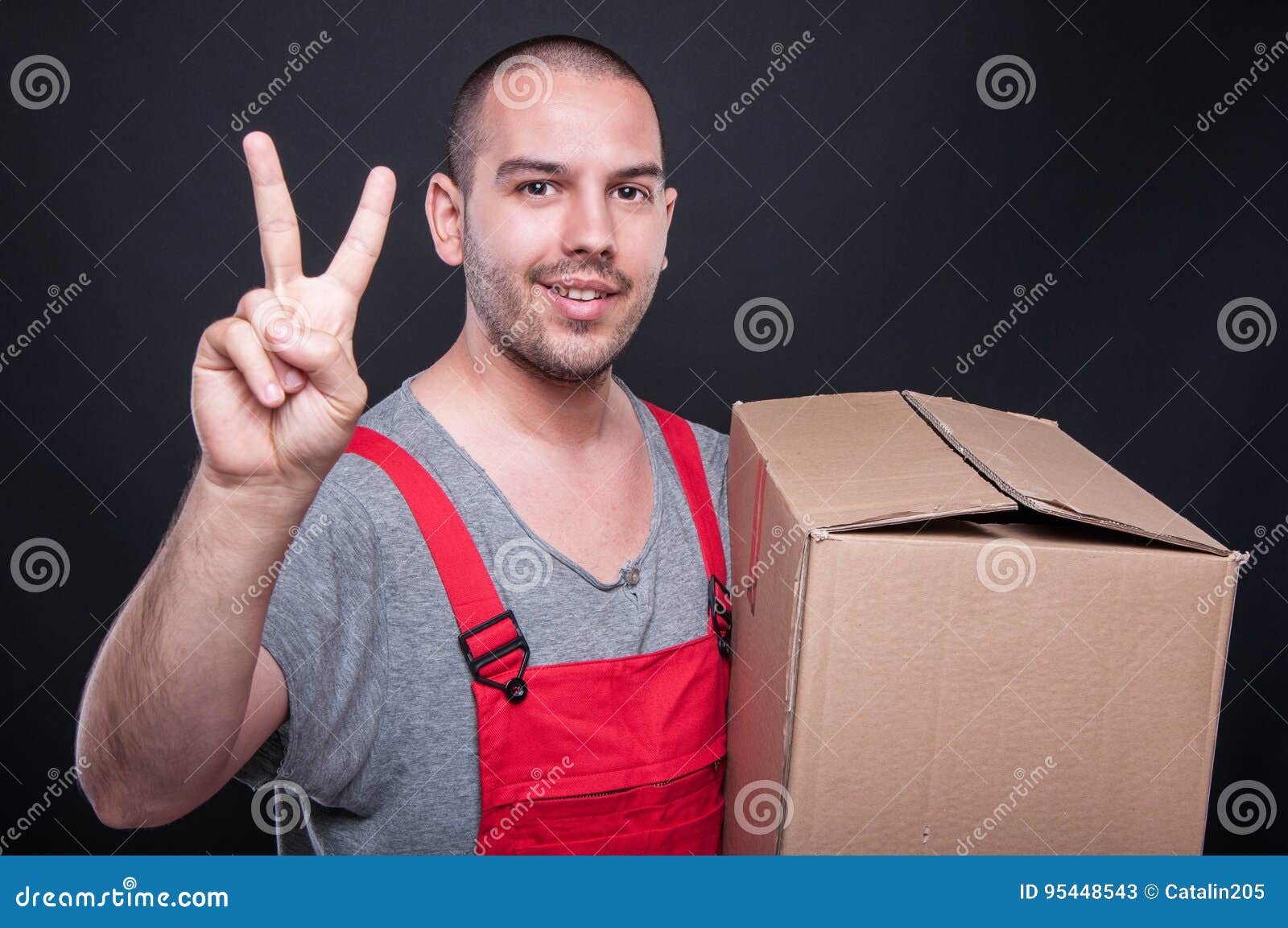 Mover Man Holding Box Showing Peace Gesture Stock Image - Image of mover, packing: 95448543