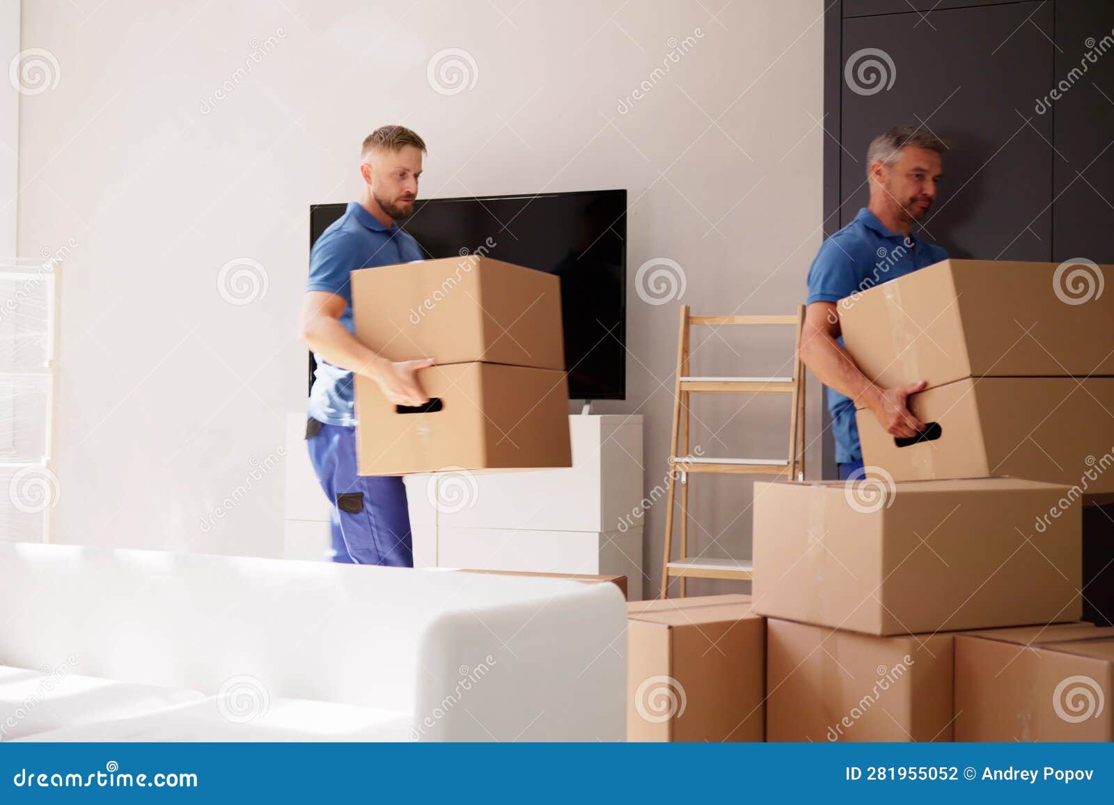 Movers Delivering Packaging Boxes Stock Photo - Image of packing ...