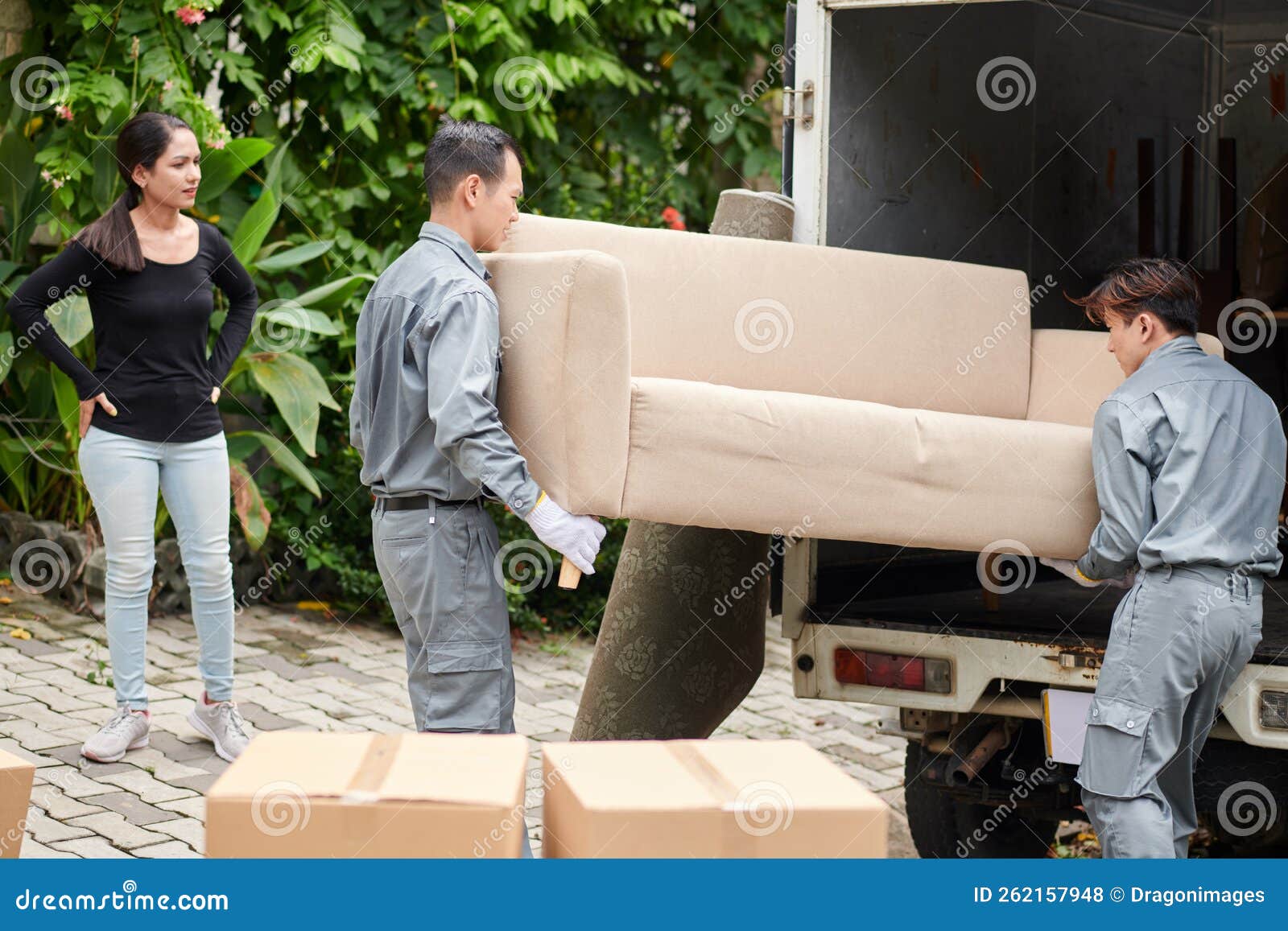 Movers Loading Couch in Van Stock Photo - Image of packing, occupation ...