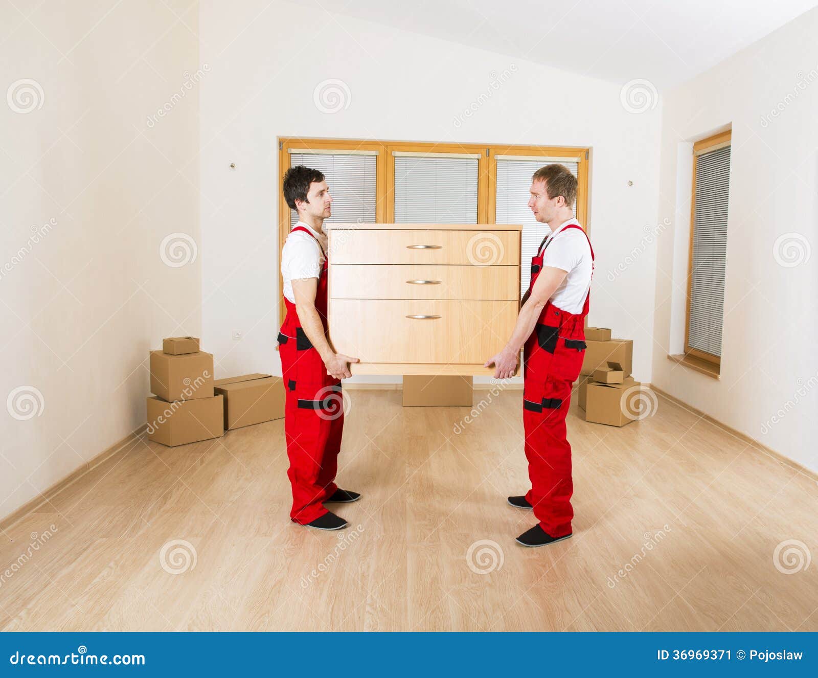 Movers in new house stock image. Image of moving, adult - 36969371