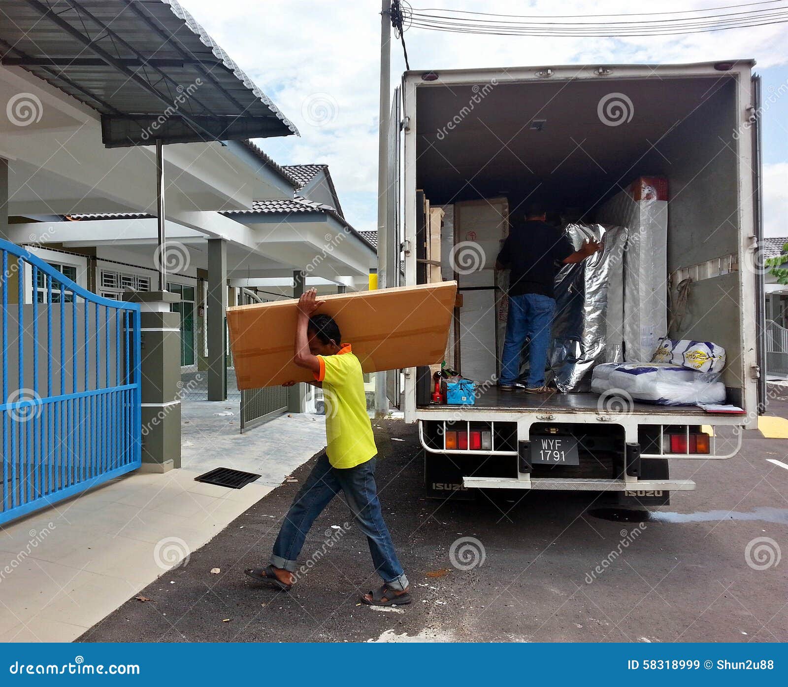 Movers Unloading a Moving Van Editorial Stock Image - Image of exterior ...