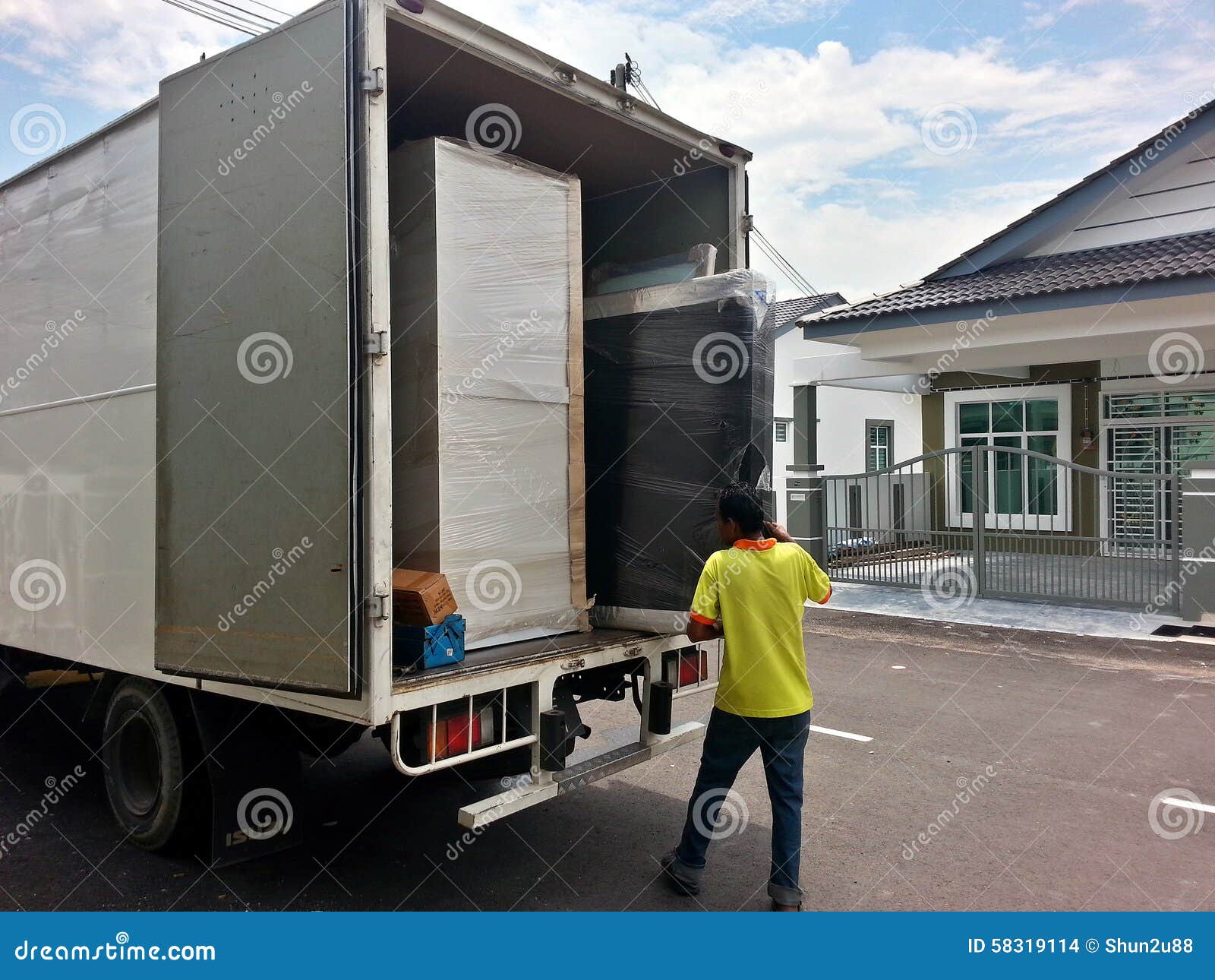 Movers Unloading a Moving Van Editorial Stock Image - Image of person ...