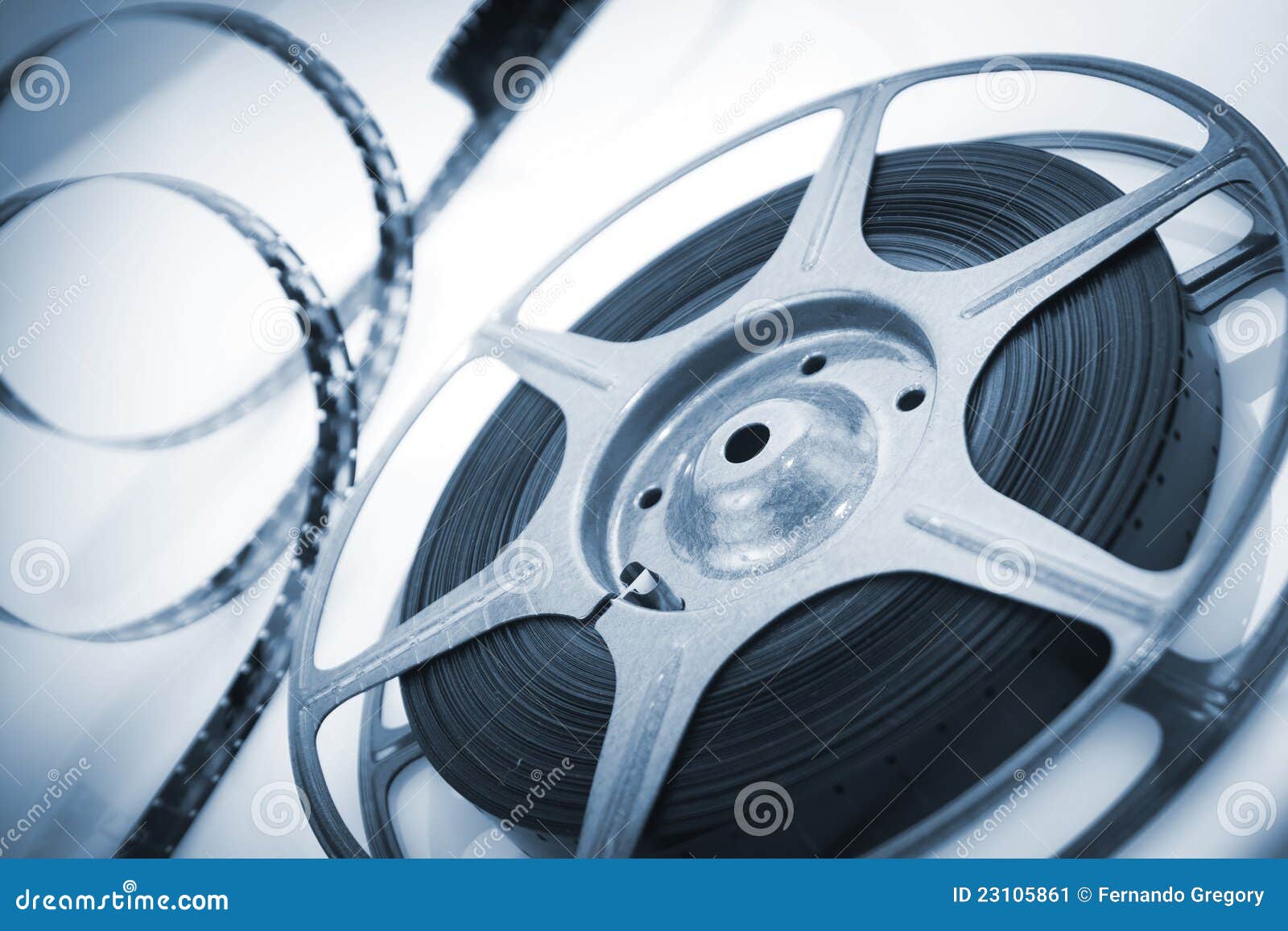 Movie spool with film stock image. Image of background - 23105861