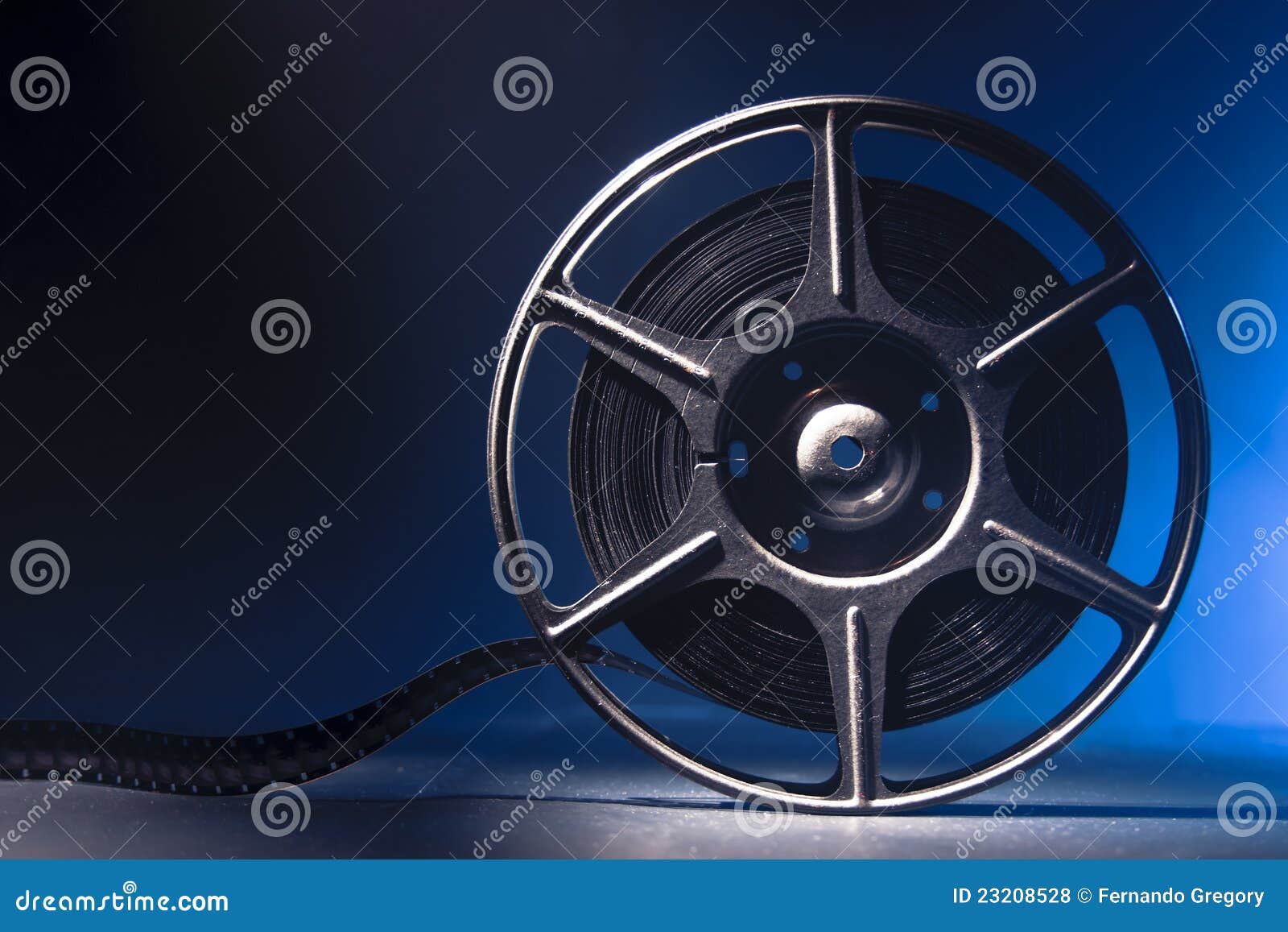 Movie spool with film stock photo. Image of film, filmstrip - 23208528