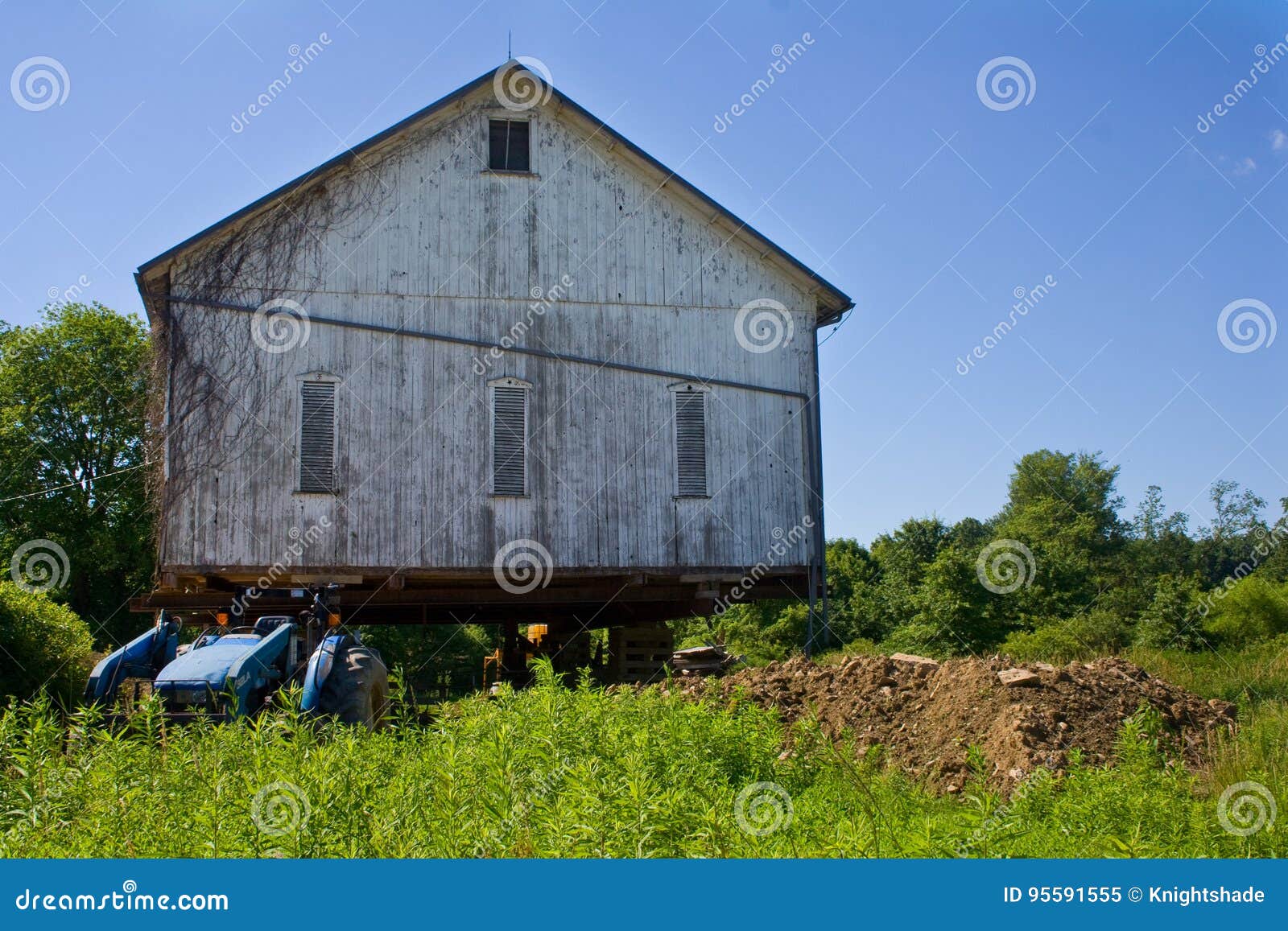 Moving a barn stock image. Image of balanced, raised - 95591555