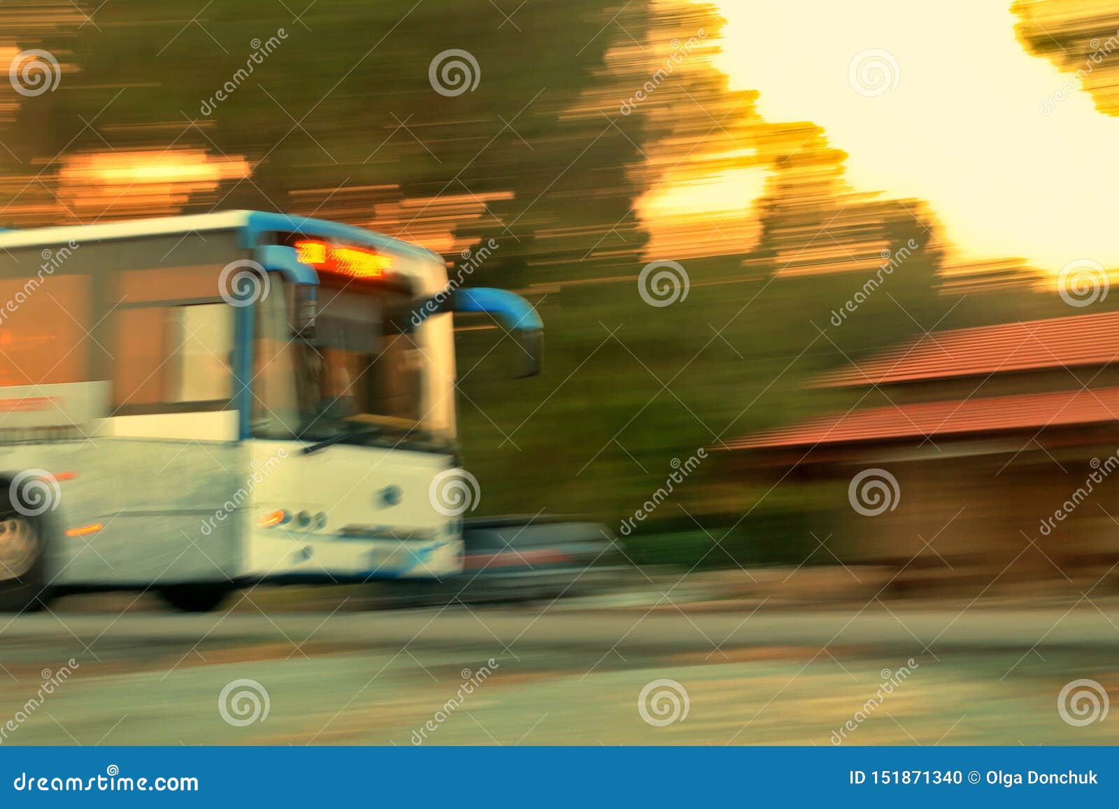 Moving blue bus on a road stock photo. Image of vehicle - 151871340
