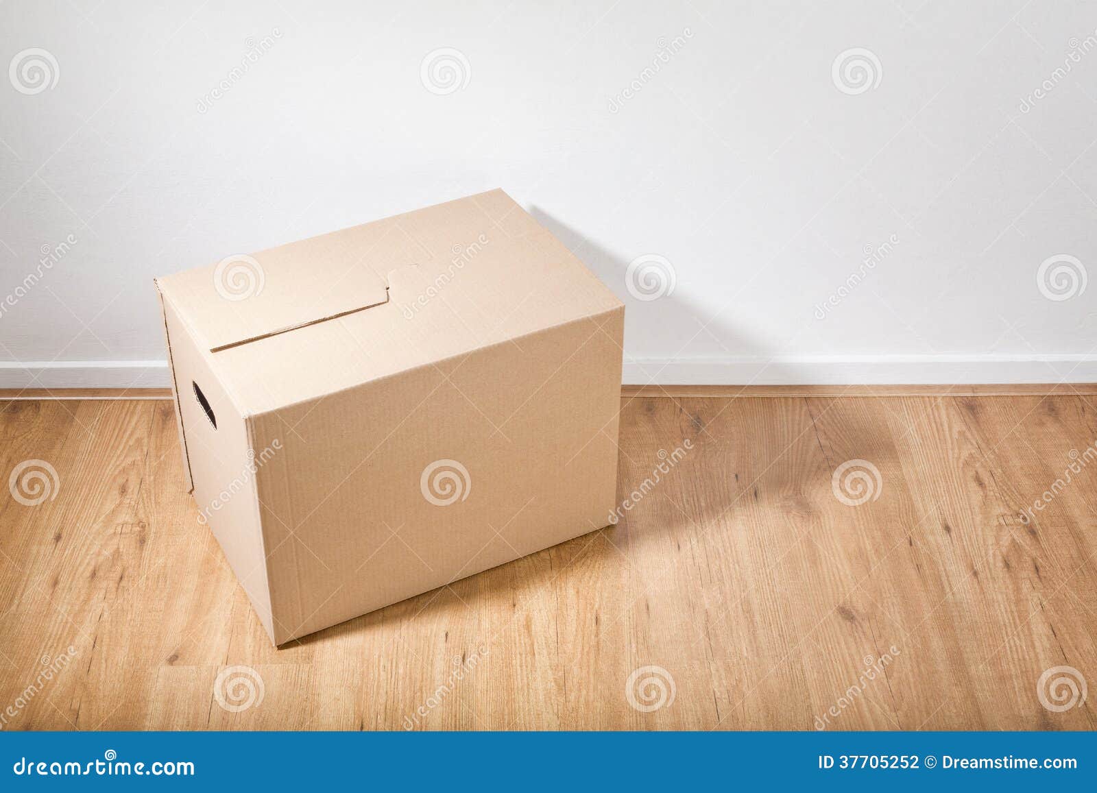 Moving Box on the Floor stock photo. Image of pack, wall - 37705252