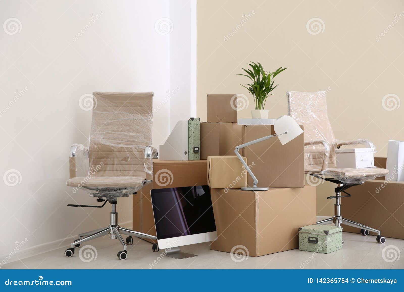 Moving boxes and furniture stock photo. Image of cardboard - 142365784