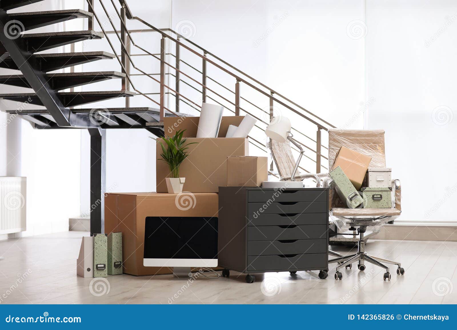 Moving boxes and furniture stock photo. Image of rent - 142365826