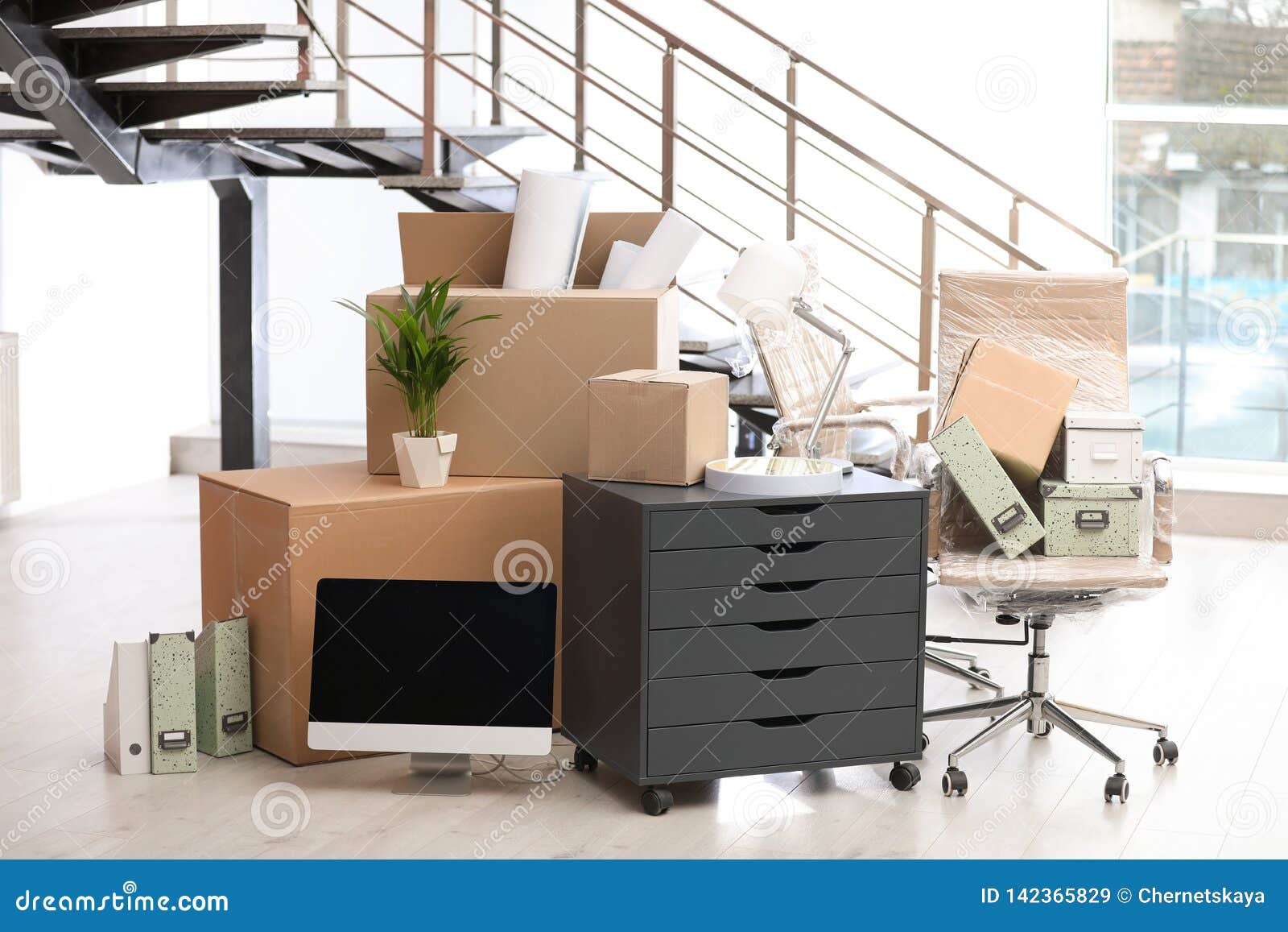 Moving boxes and furniture stock image. Image of moving - 142365829