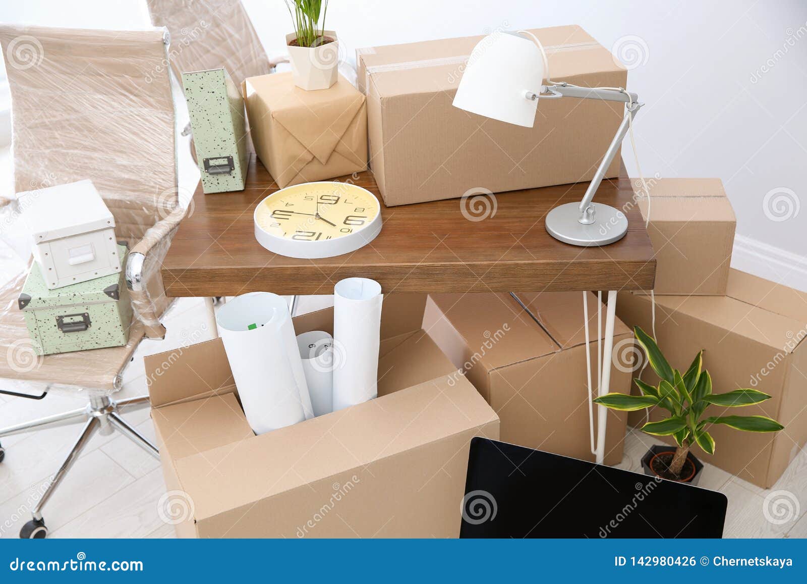 Moving boxes and furniture stock photo. Image of delivery - 142980426