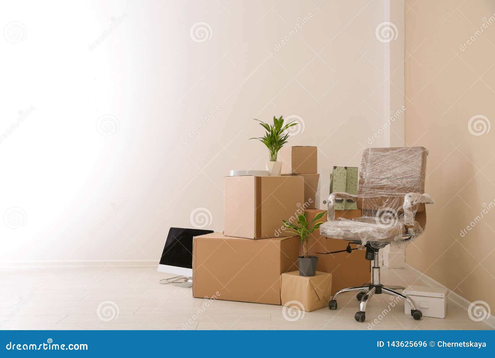 Moving Boxes and Furniture in Office. Space for Text Stock Photo ...