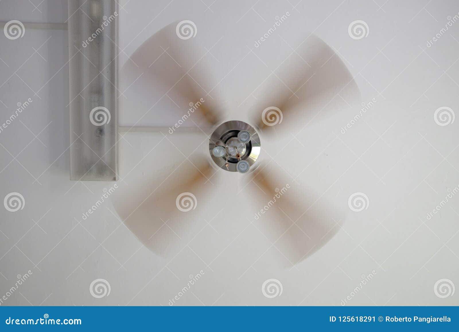 Moving ceiling fan stock image. Image of light, moving - 125618291