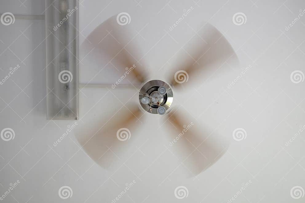 Moving ceiling fan stock image. Image of light, moving - 125618291