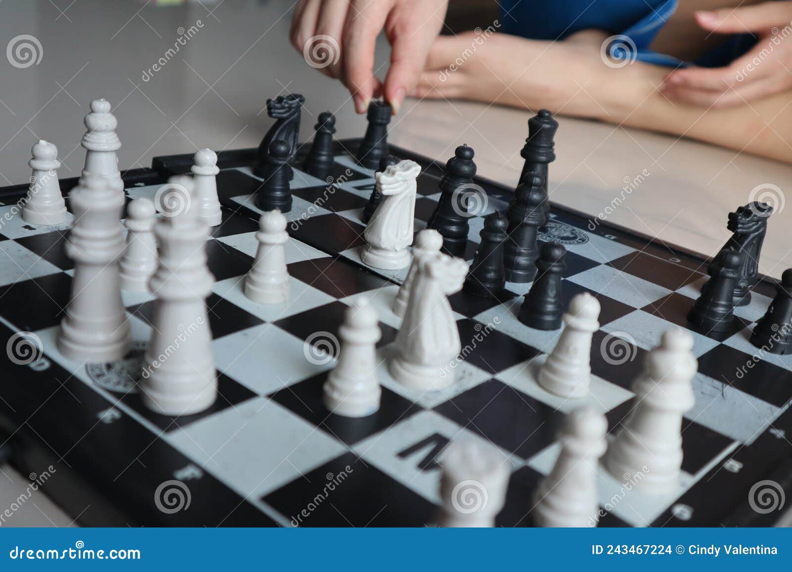 Moving a Chess Piece while Playing a Chess Game at Home Stock Photo ...