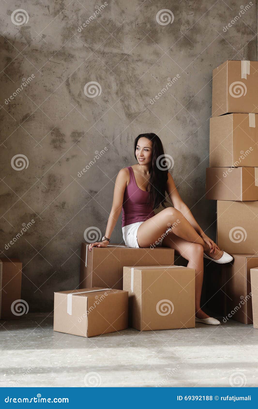 Moving stock photo. Image of casual, move, cardboard - 69392188